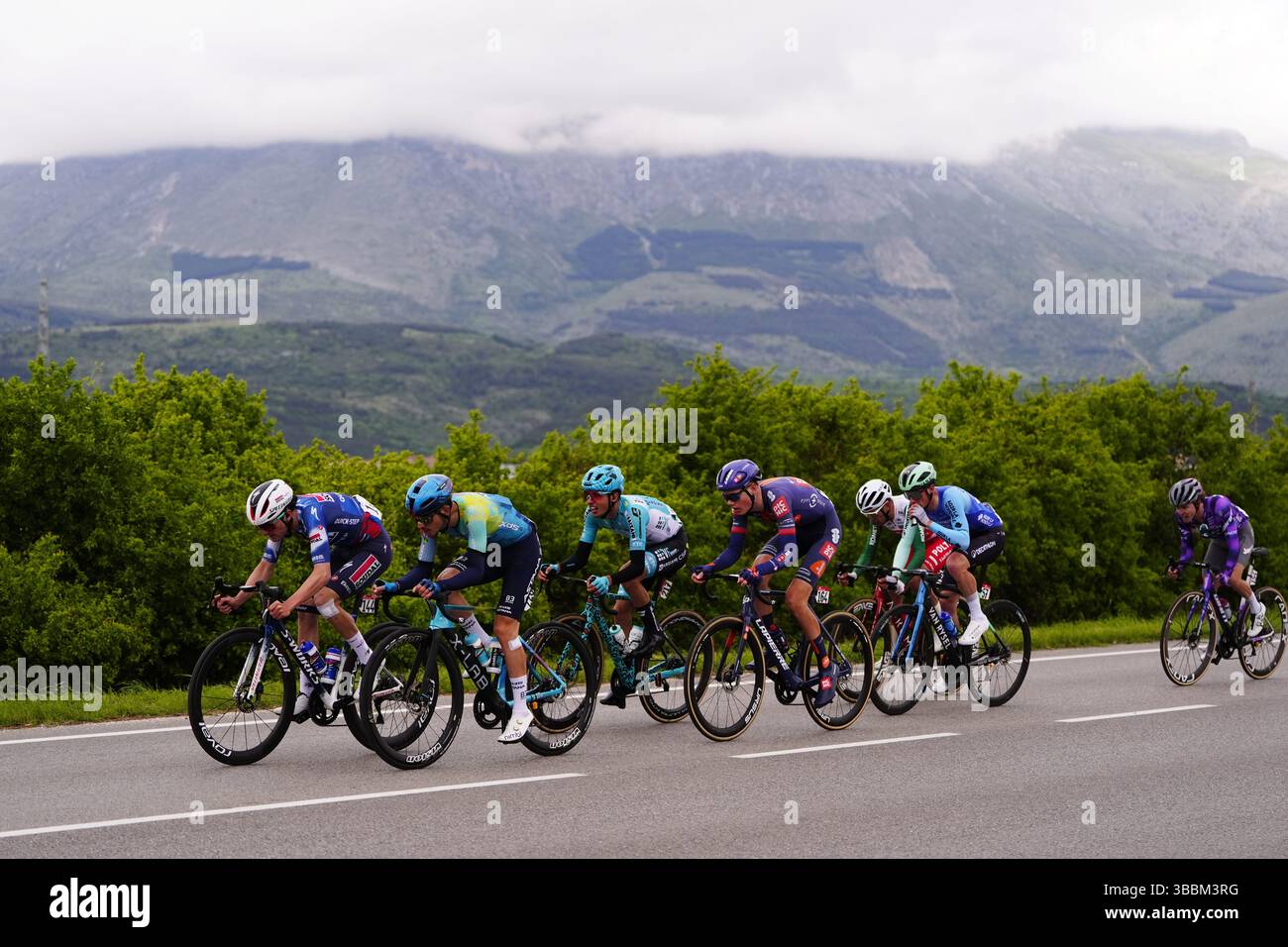 The pack rides cycles during the stage 7 of the Giro d’Italia from ...