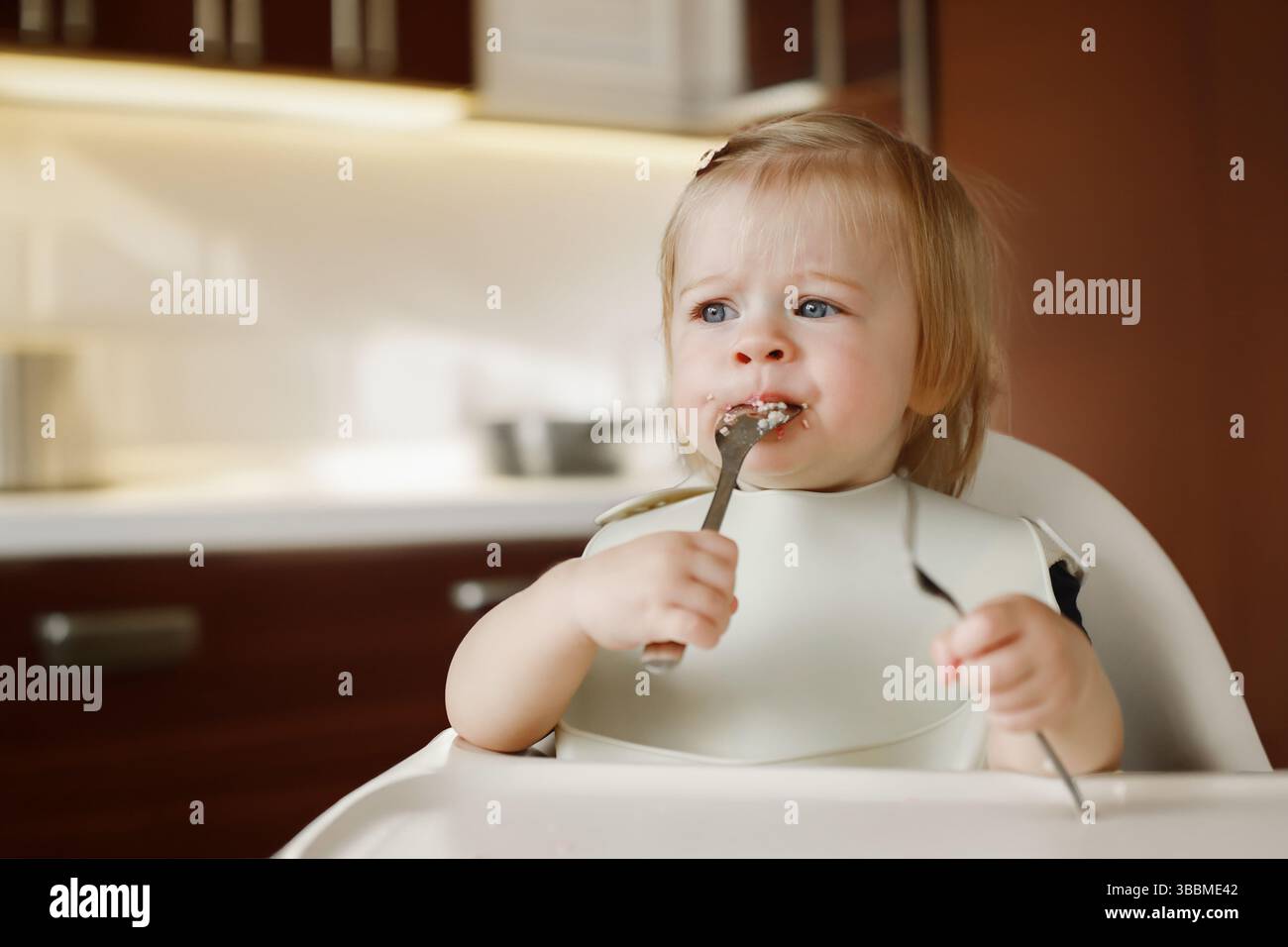 Learn to feed hi-res stock photography and images - Alamy