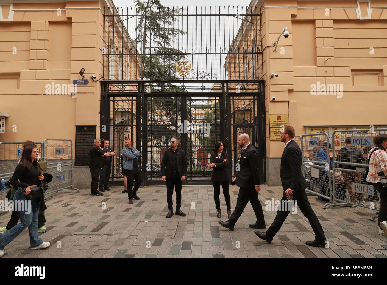 Security members stand outside the Russian consulate, in Istanbul ...