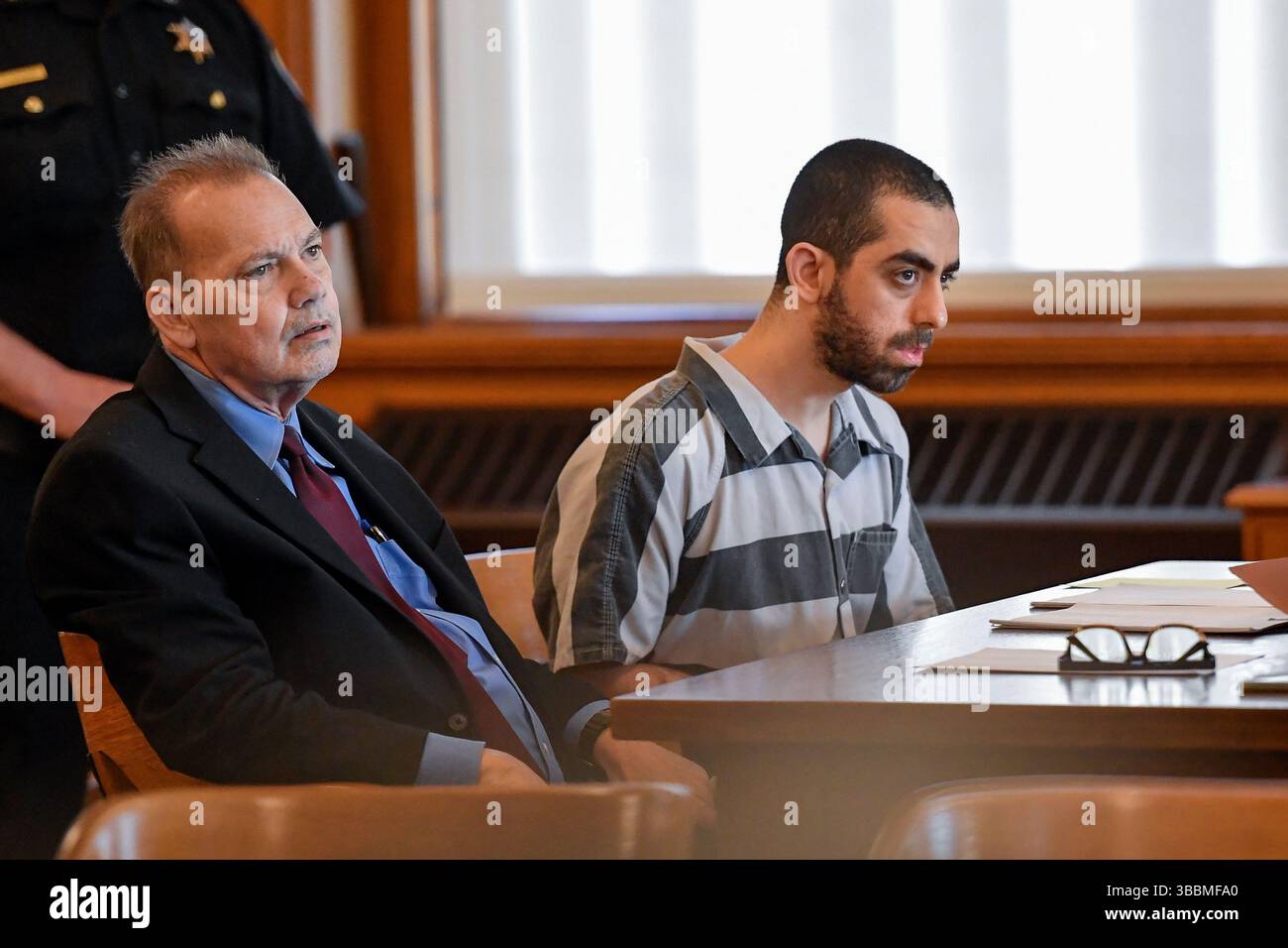 Hadi Matar, right, and public defender Nathaniel Barone sit in ...