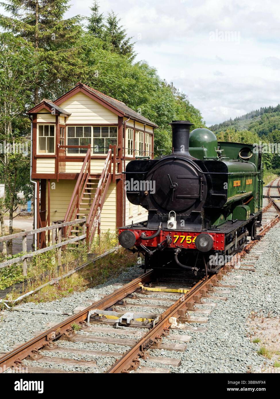 Ex-GWR pannier tank No 7754 stands by the signal box at the newly re ...