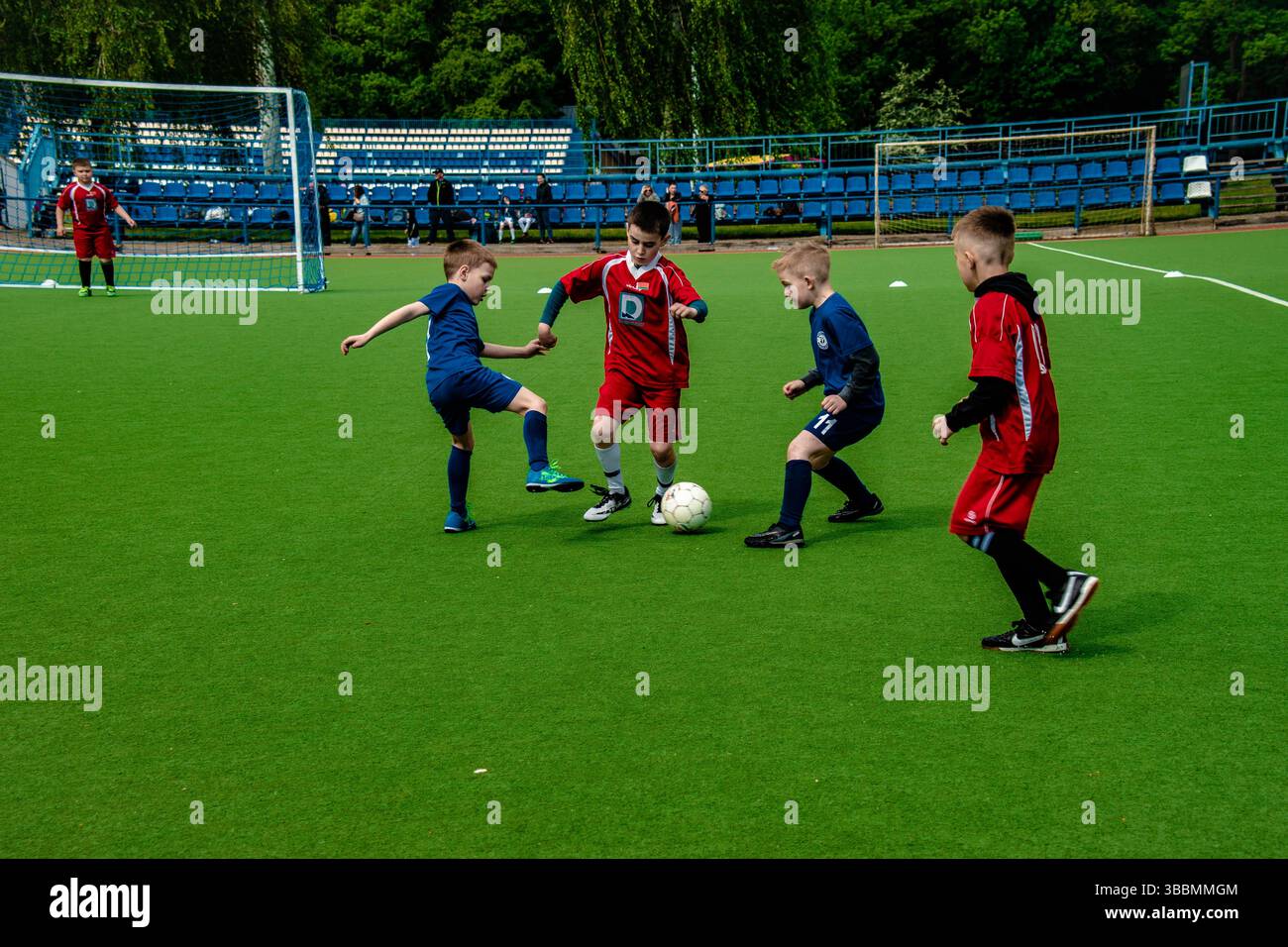 Soccer player kicking ball on field hi-res stock photography and images ...