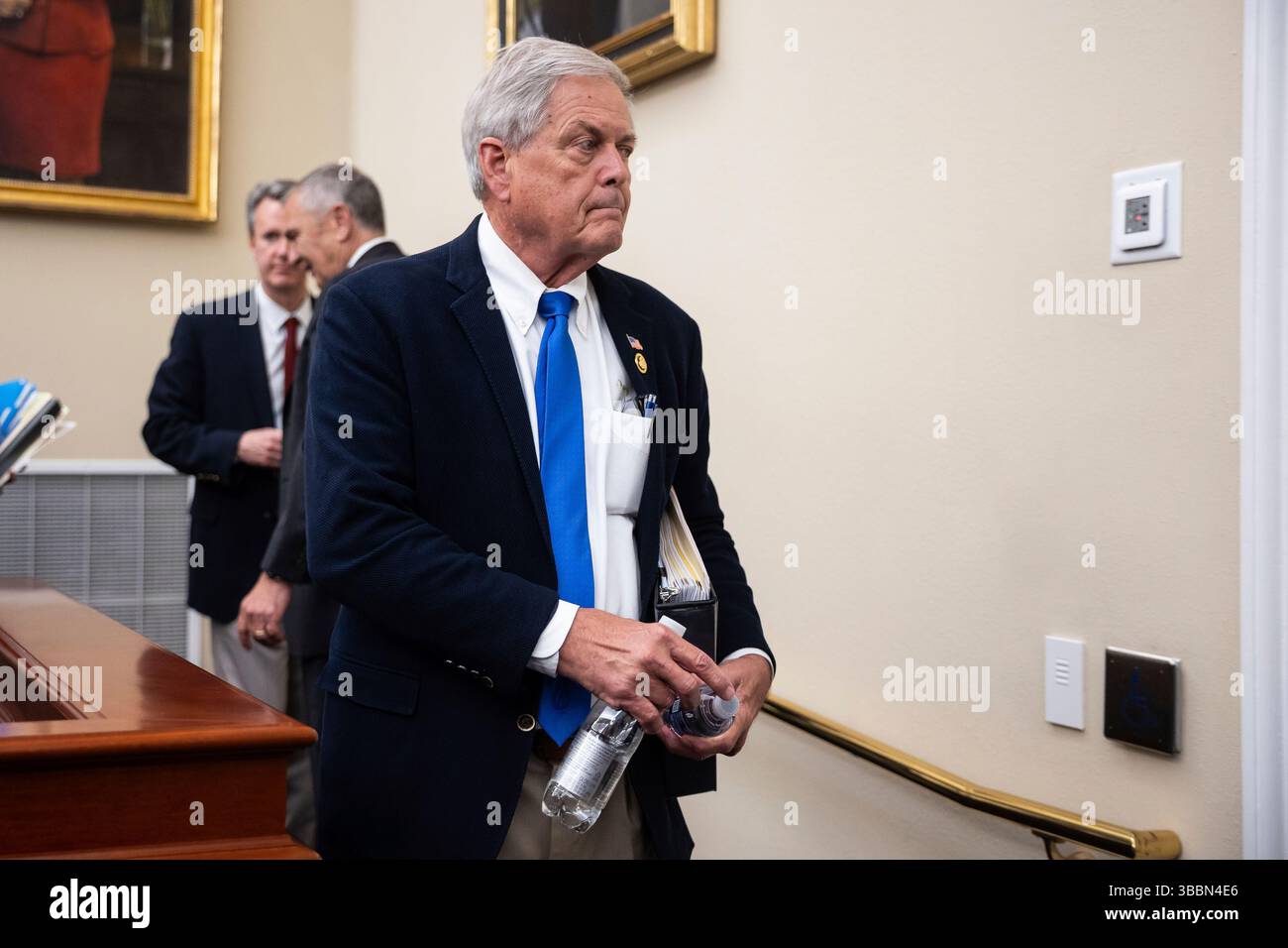 Rep. Ralph Norman (R-S.C.) departs a House Budget Committee markup of a ...