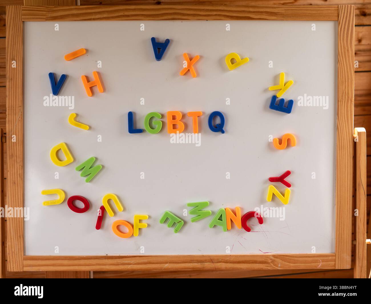 Colorful Magnetic Letters "LGBT" on a Wooden Frame Whiteboard in ...