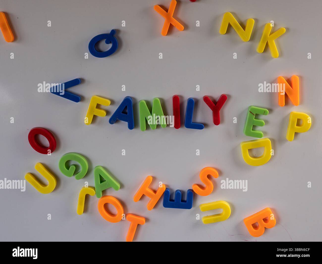 Colorful Magnetic Letters "family" on a Wooden Frame Whiteboard in ...