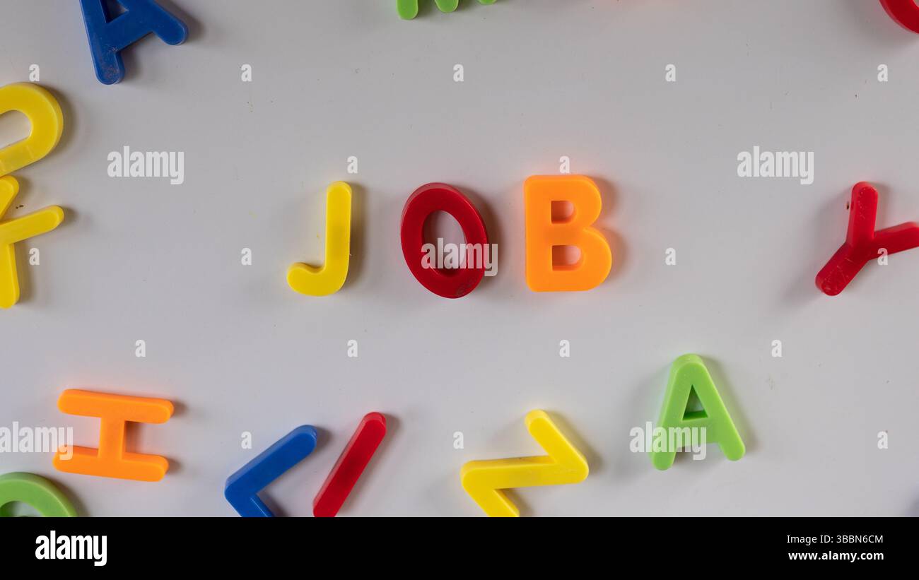 Colorful Magnetic Letters Job on a Wooden Frame Whiteboard in Classroom ...