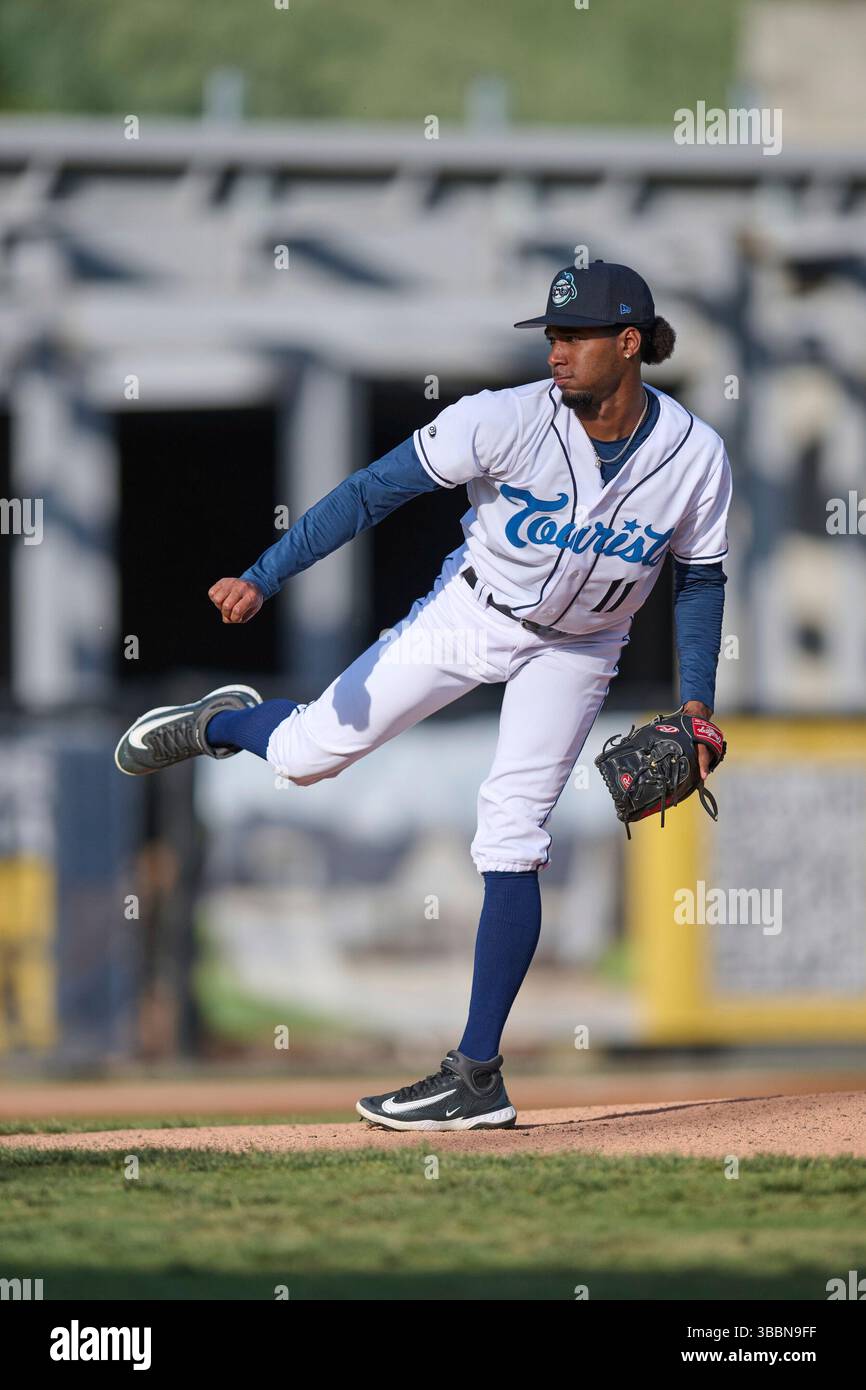 Asheville Tourists starting pitcher Yeriel Santos (11) delivers a ...