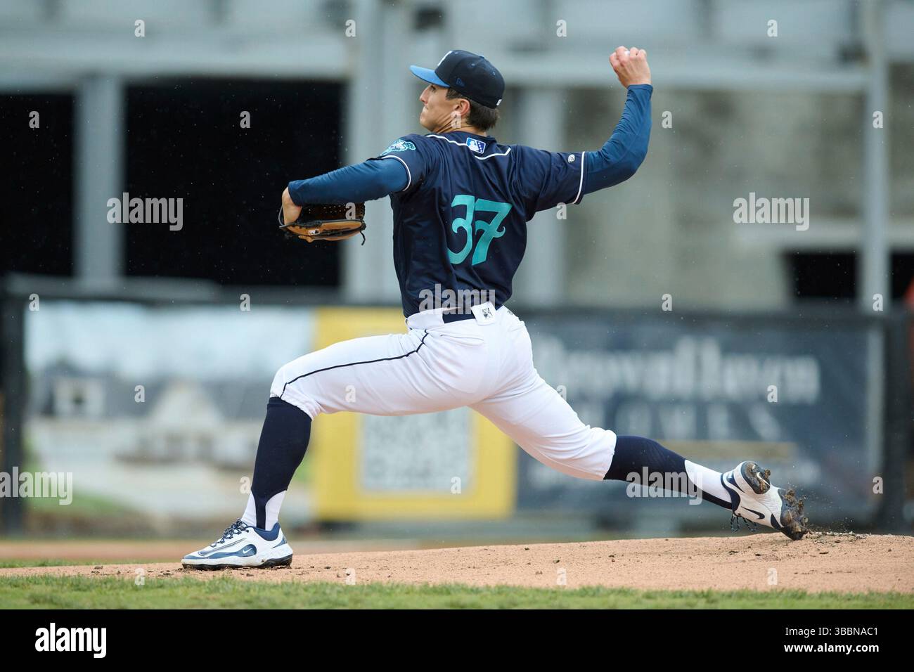 Asheville Tourists starting pitcher Bret Gillis (37) delivers a pitch ...