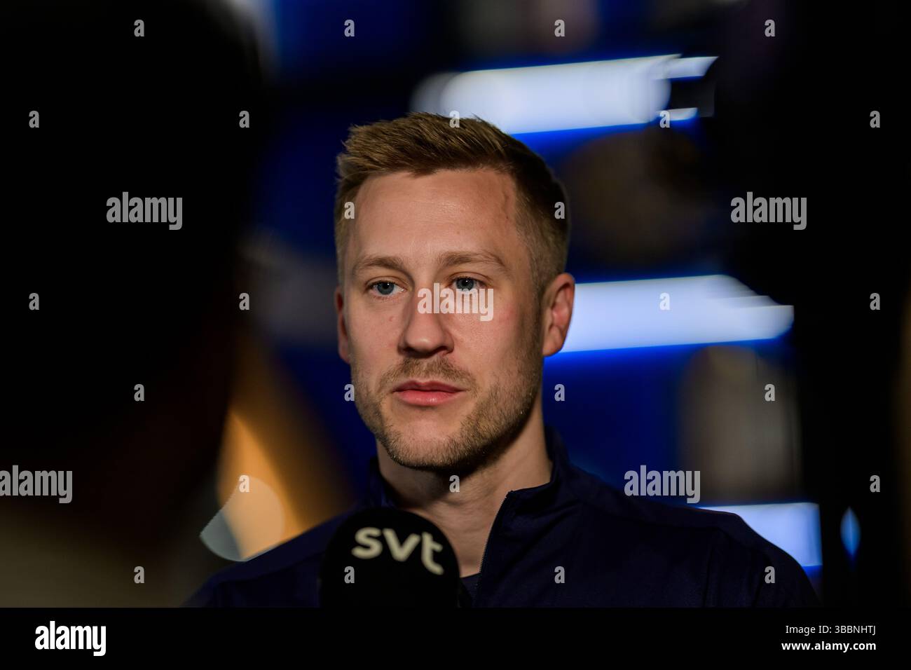 Mattias Falck of, Sweden. , . is interviewed by the media during a ...