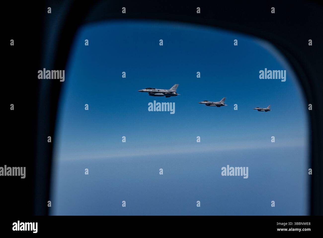 Three fighter jets from the UAE Air Force escort Air Force One with ...