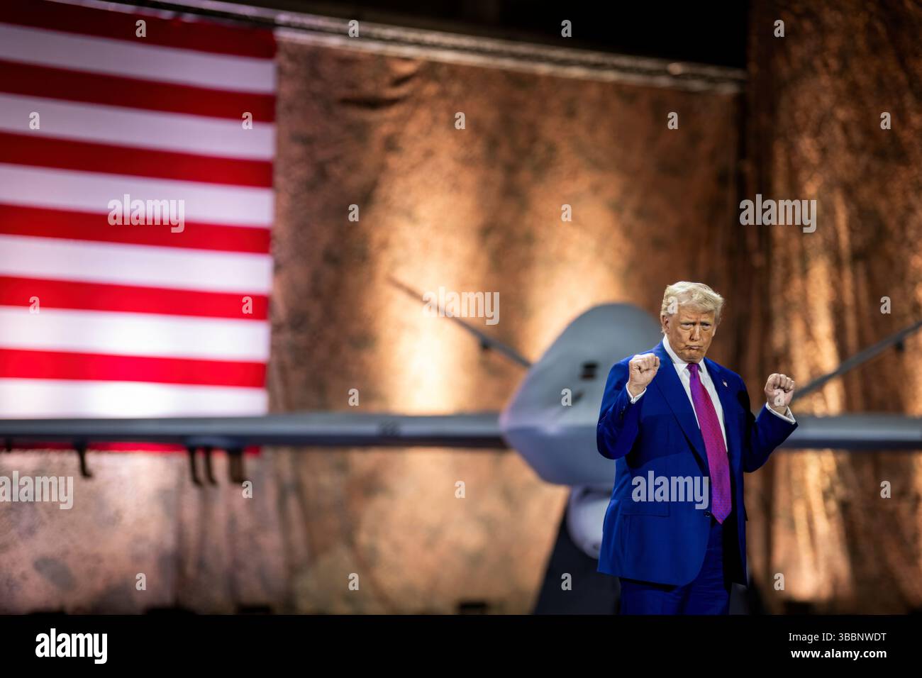 President Donald Trump delivers delivers remarks to troops at Al Udeid ...