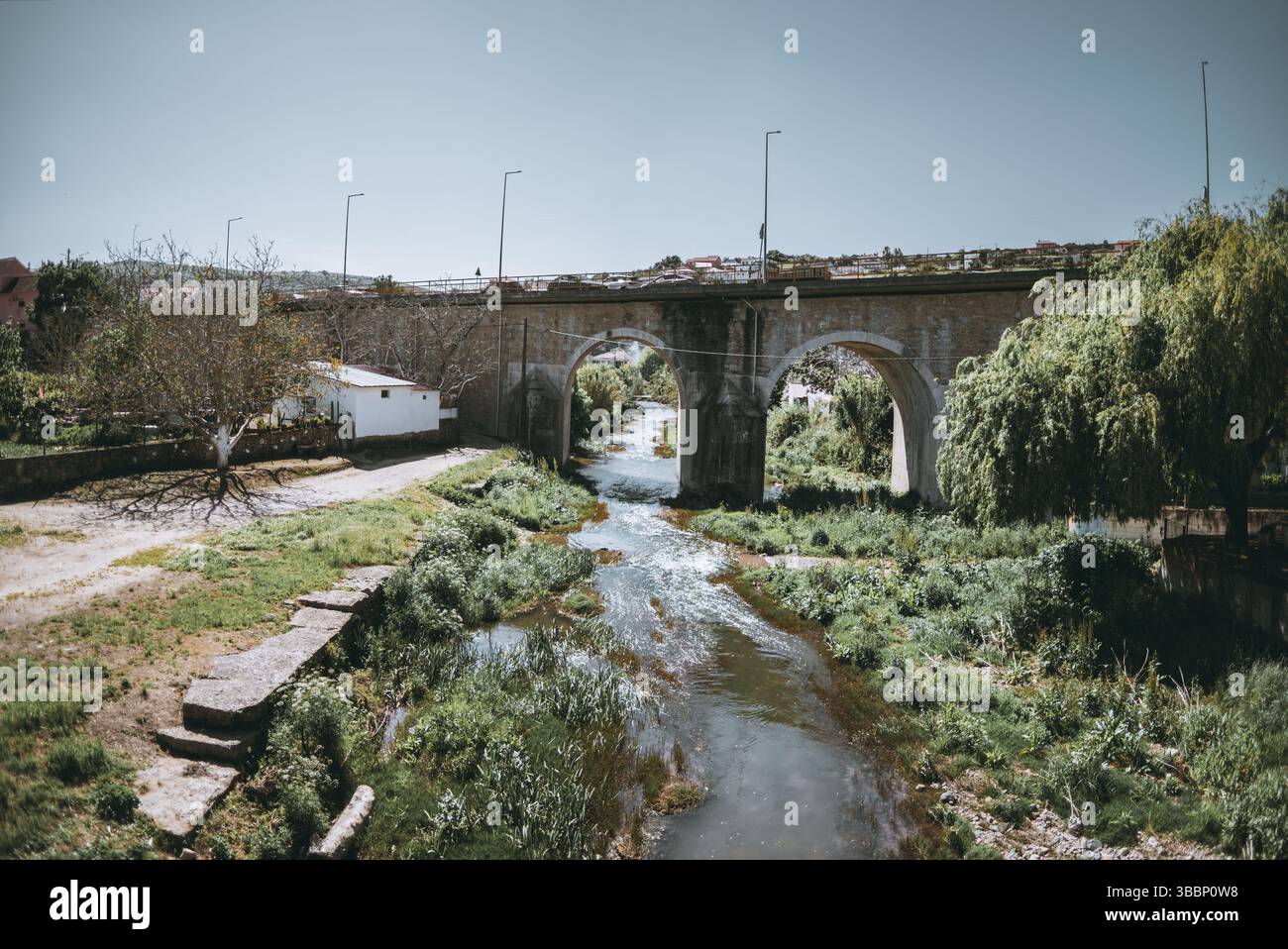 Scenic view of a historic stone bridge with multiple arches spanning a ...