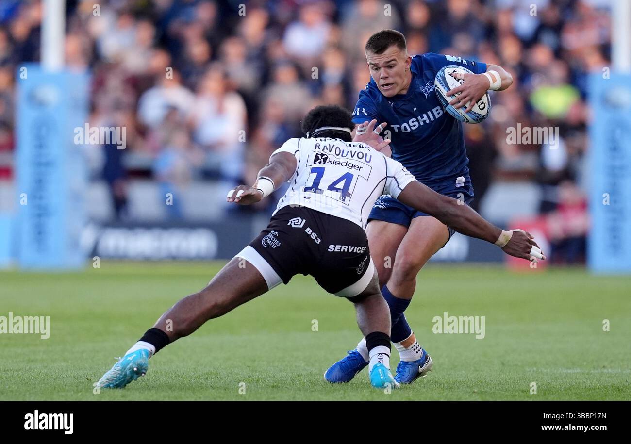 Sale Sharks' Joe Carpenter (right) is tackled by Bristol's Kalaveti ...