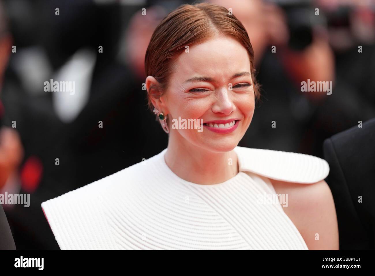 Emma Stone poses for photographers upon arrival at the premiere of the ...
