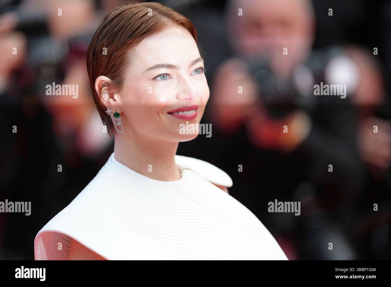 Emma Stone poses for photographers upon arrival at the premiere of the ...