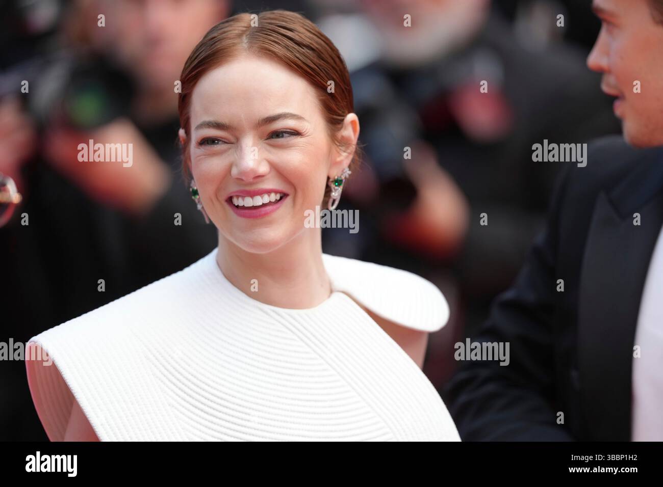 Emma Stone poses for photographers upon arrival at the premiere of the ...