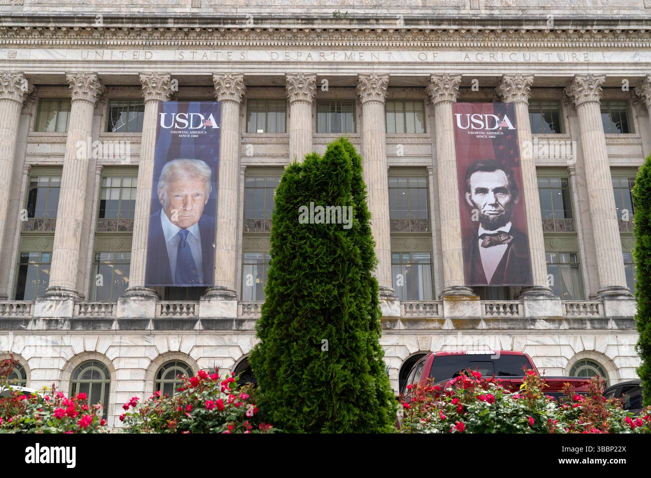 Banners with the photographs of President Donald Trump and President ...