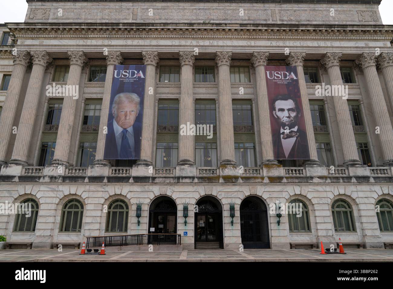 Banners with the photographs of President Donald Trump and President ...