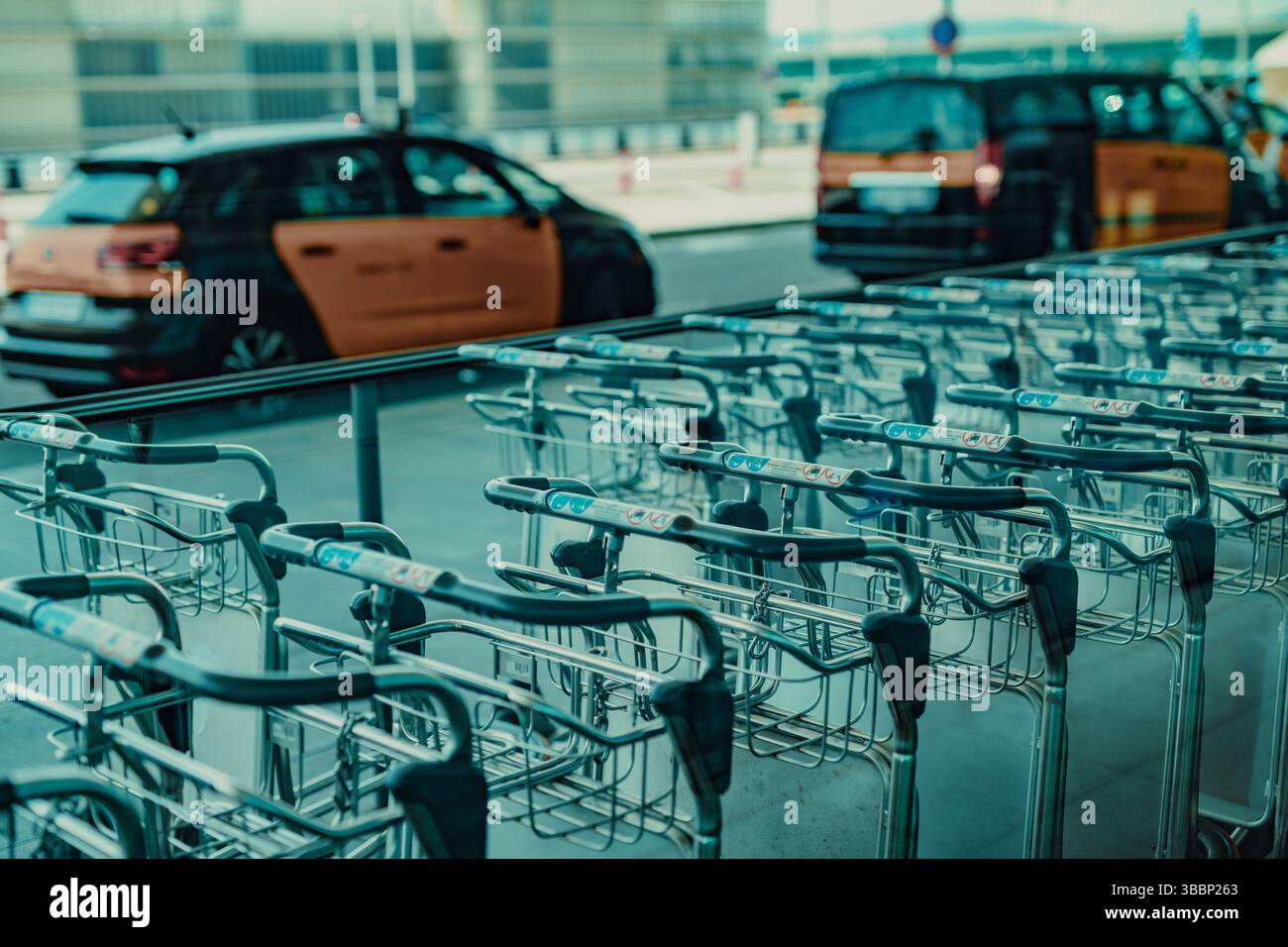 Airport carts and taxi on background Stock Photo - Alamy
