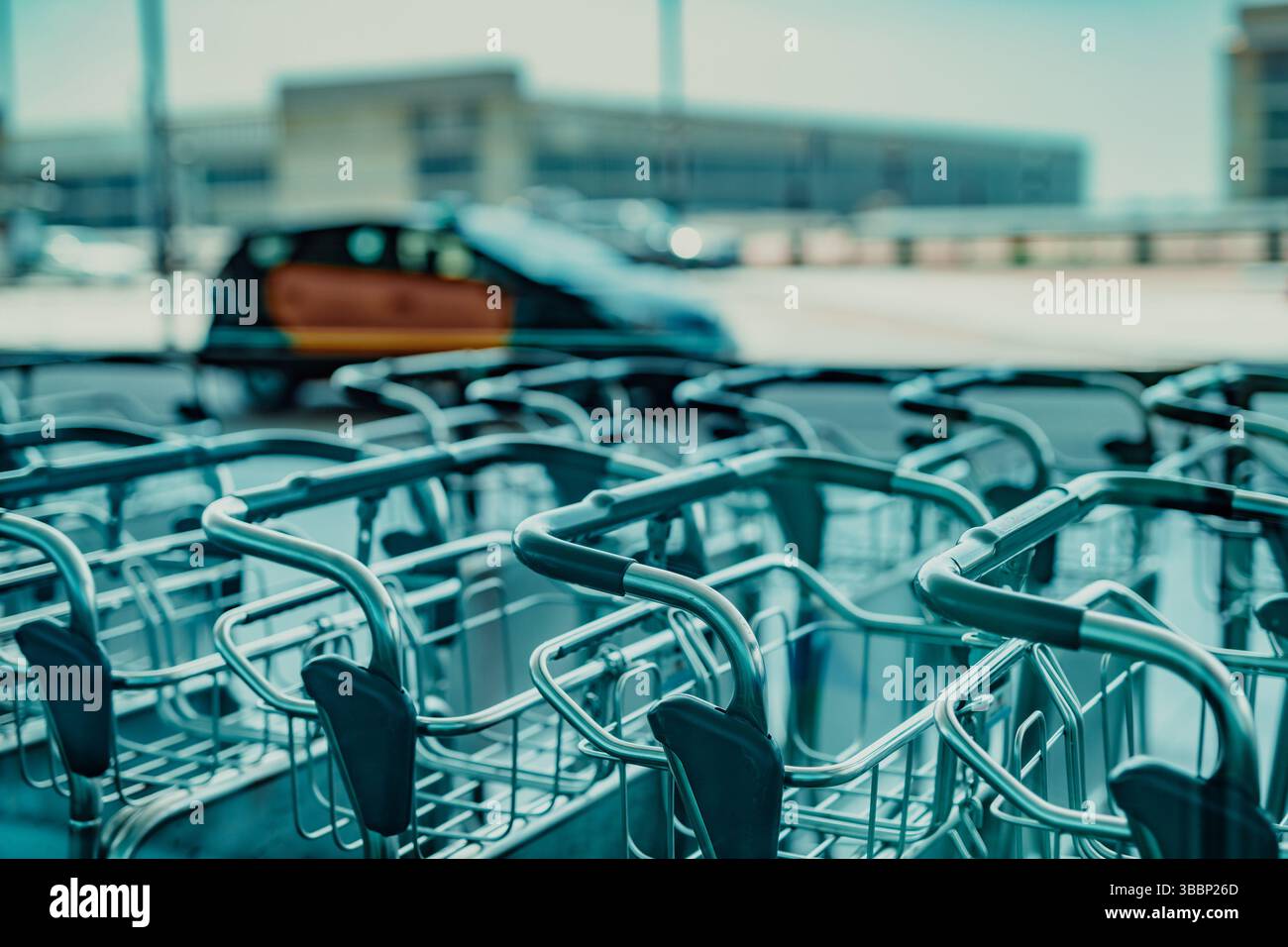 Airport carts and taxi in the background Stock Photo - Alamy