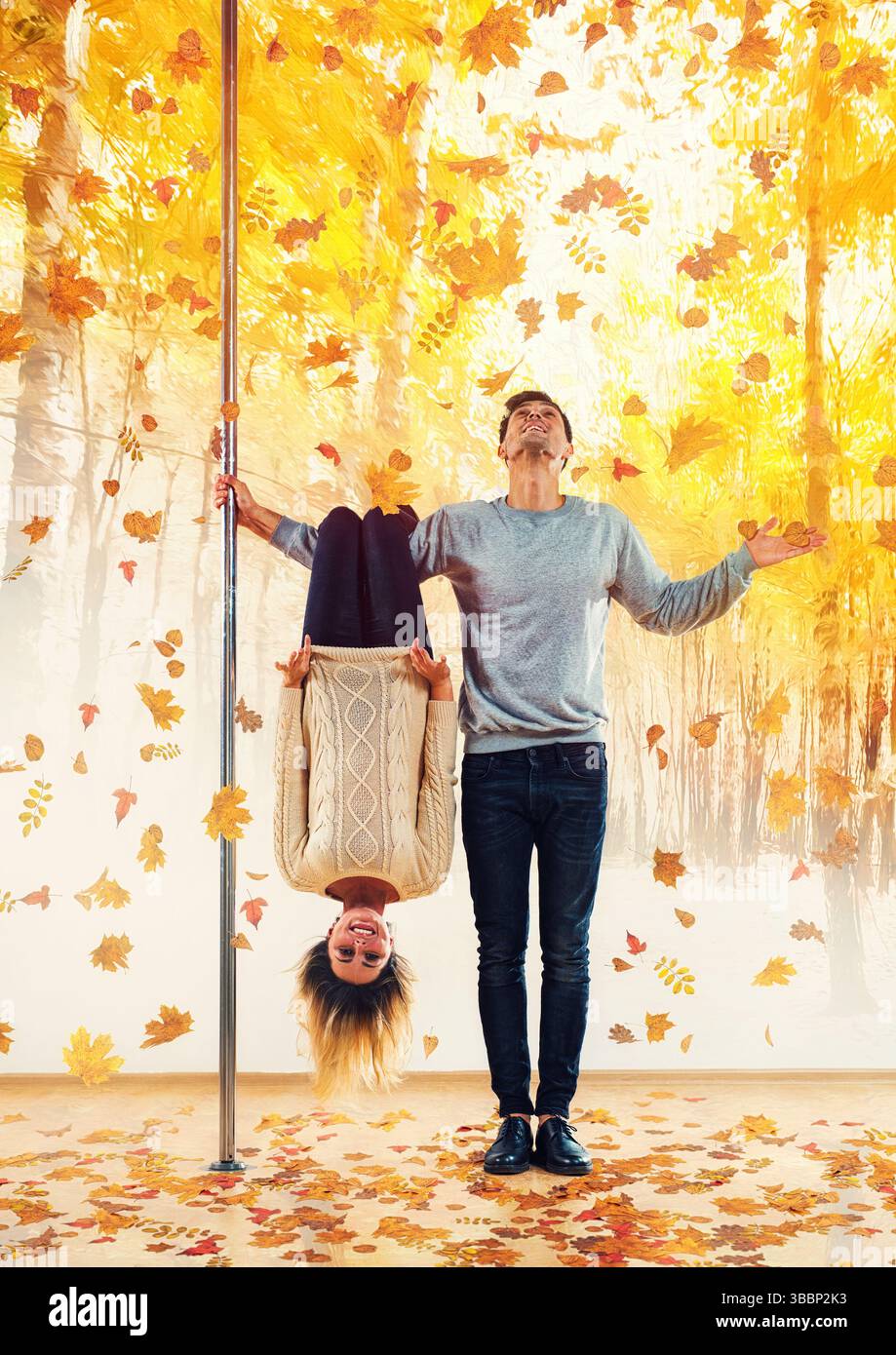 Young happy man and woman pole dancers autumn concept Stock Photo - Alamy