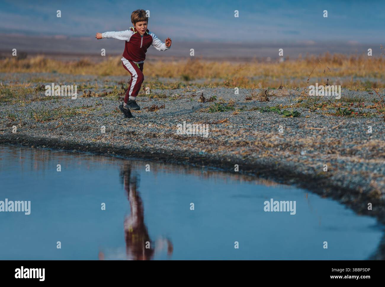 Side view active boy hi-res stock photography and images - Alamy