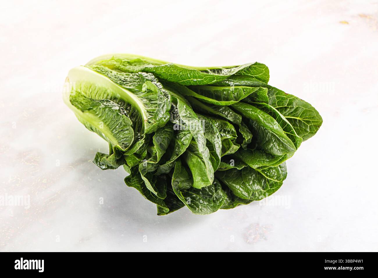 Green fresh juicy Romano salad for cooking Stock Photo - Alamy