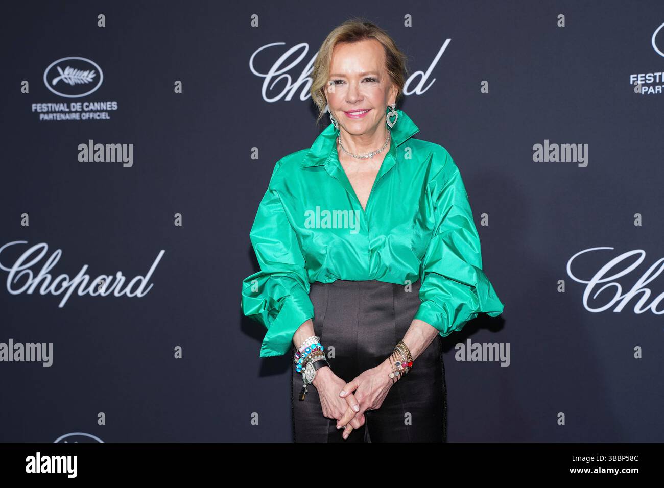 Chopard president Caroline Scheufele poses for photographers upon ...