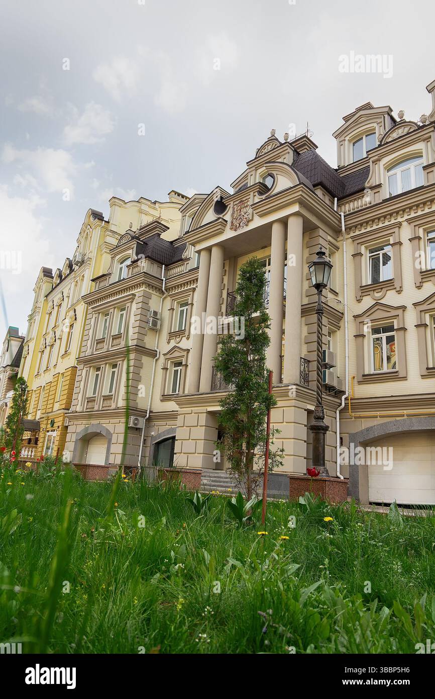 Beautiful house in classical style and green lawn. Architecture Stock ...