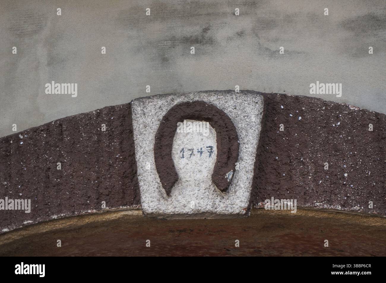 Horseshoe over entrance to an old house, from ancient superstitions to ...
