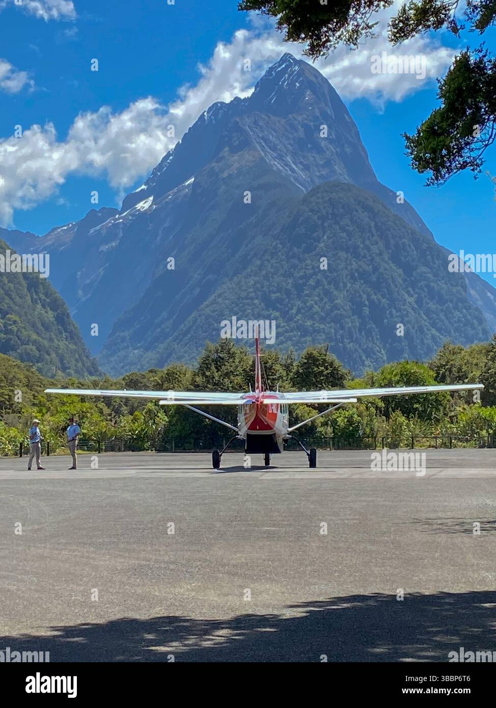 Helicopter flight and views of Milford Sound airstrip in South Island ...
