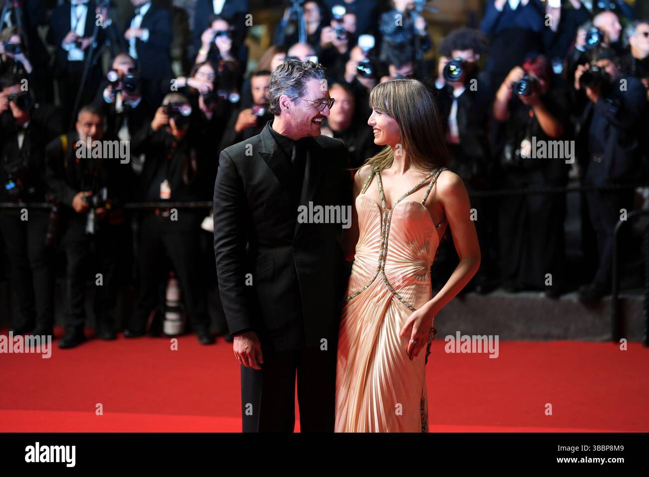 Pedro Pascal, left, and Lux Pascal pose for photographers upon ...