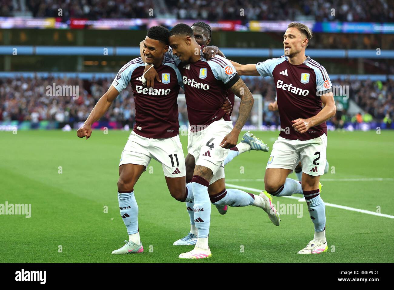 Aston Villa's Ezri Konsa (centre) celebrates scoring their side's first ...