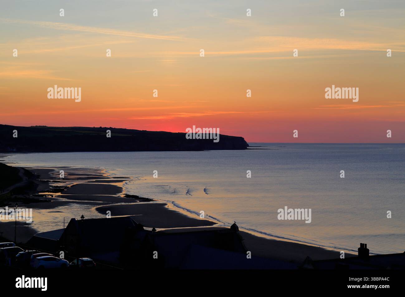 Sunset over Kettleness cliffs from Whitby, North Yorkshire, England, UK ...
