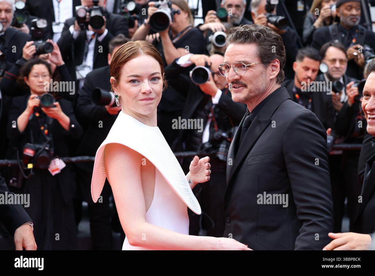 Emma Stone and Pedro Pascal at the "Eddington" red carpet at the 78th ...