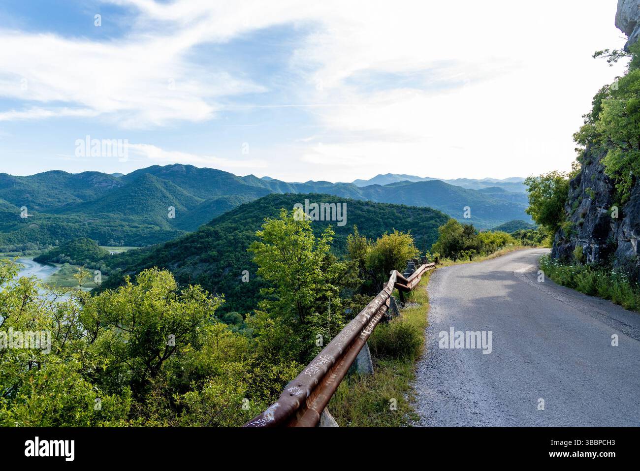 Scenic road among the mountains of Montenegro, the car is driving along ...