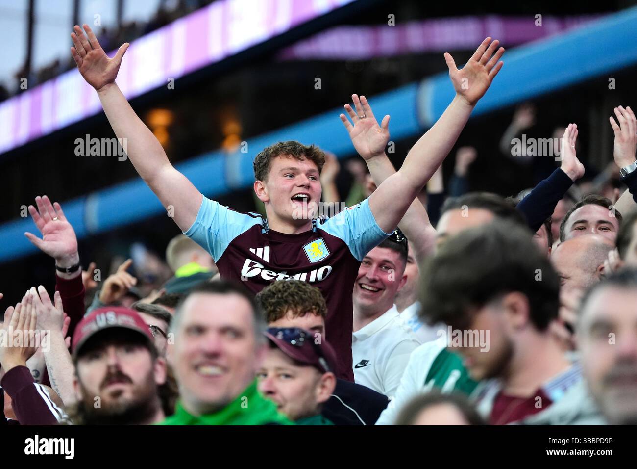 Aston Villa fans celebrate their side's second goal of the game, scored ...