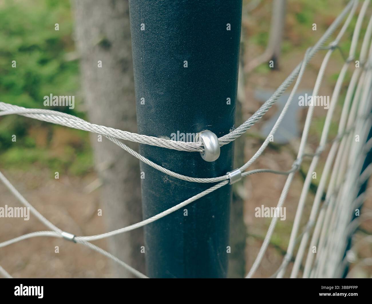 End tensioning joints on a modern wire fence. Anchor eye with thread ...