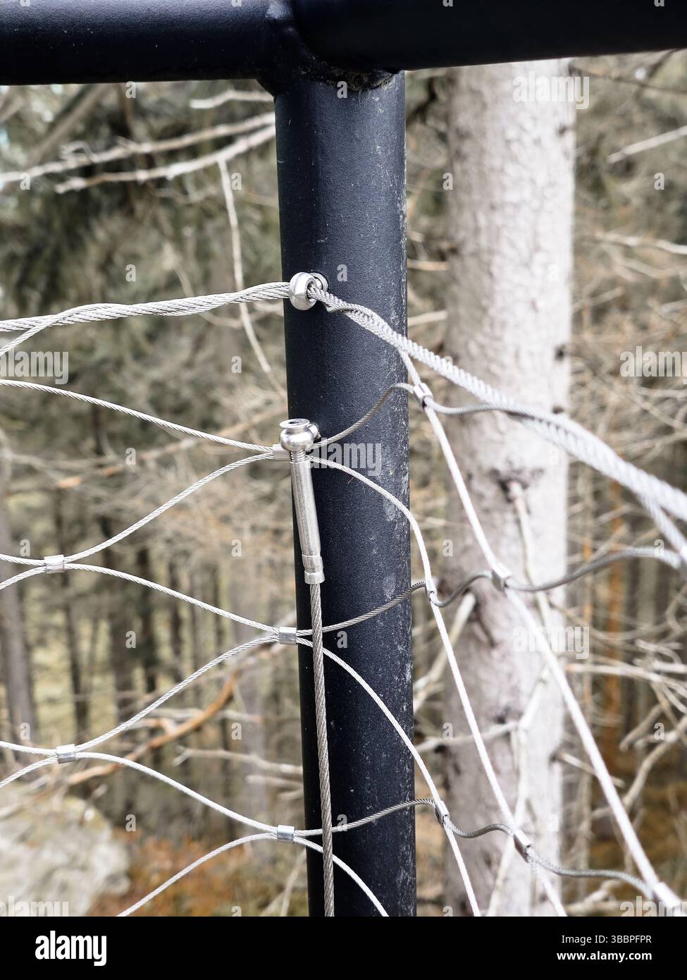 End tensioning joints on a modern wire fence. Anchor eye with thread ...