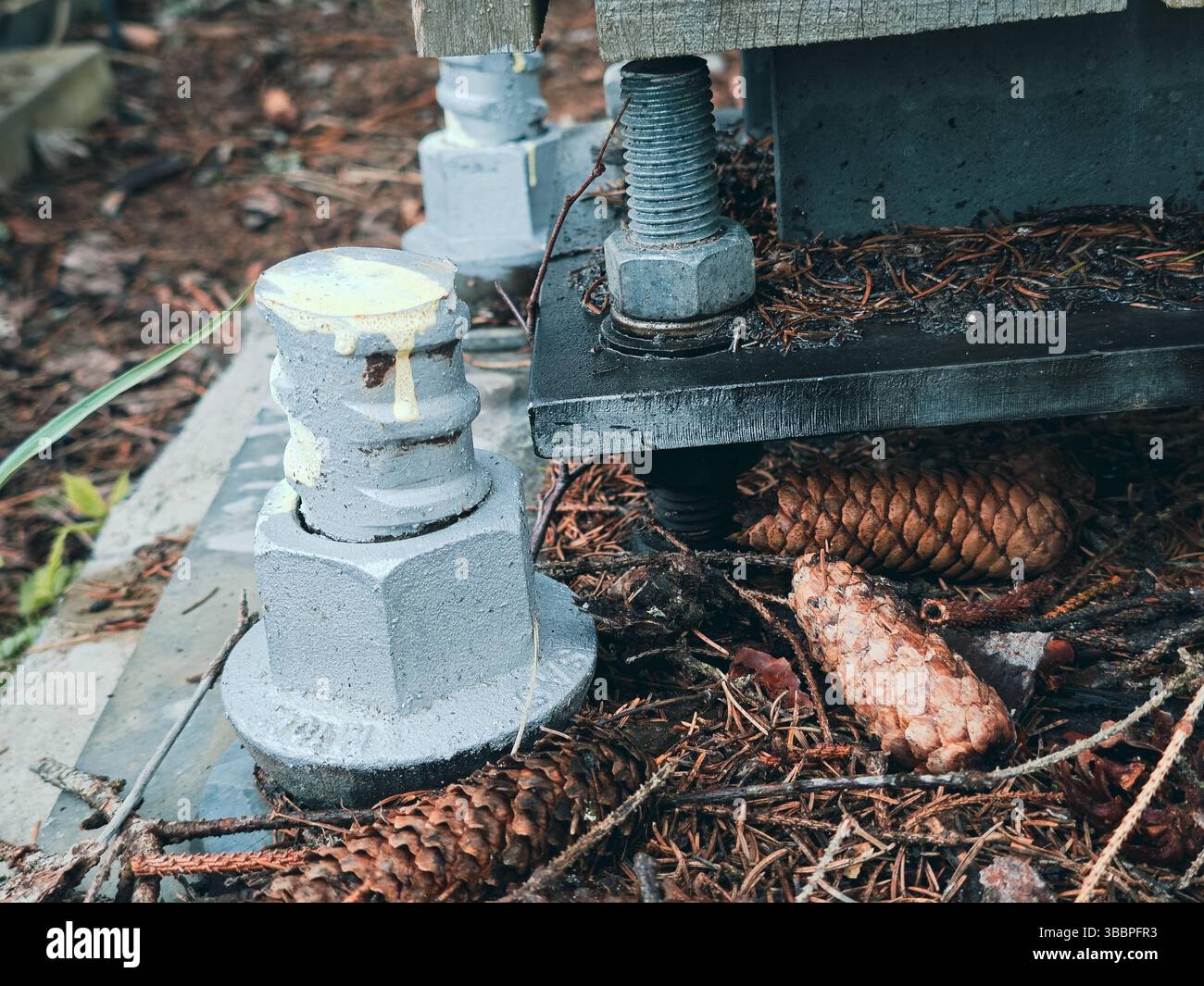 Reinforced concrete foundation with metal anchor bolts designed for the ...