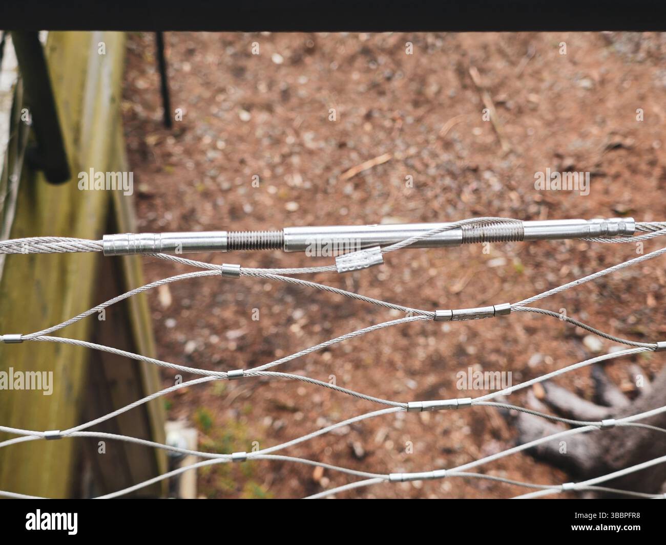 End tensioning joints on a modern wire fence. Anchor eye with thread ...
