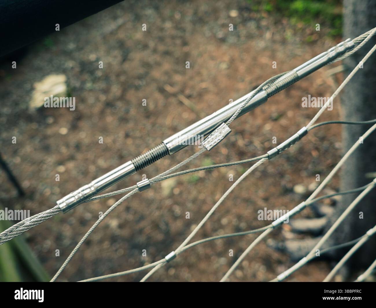 End tensioning joints on a modern wire fence. Anchor eye with thread ...