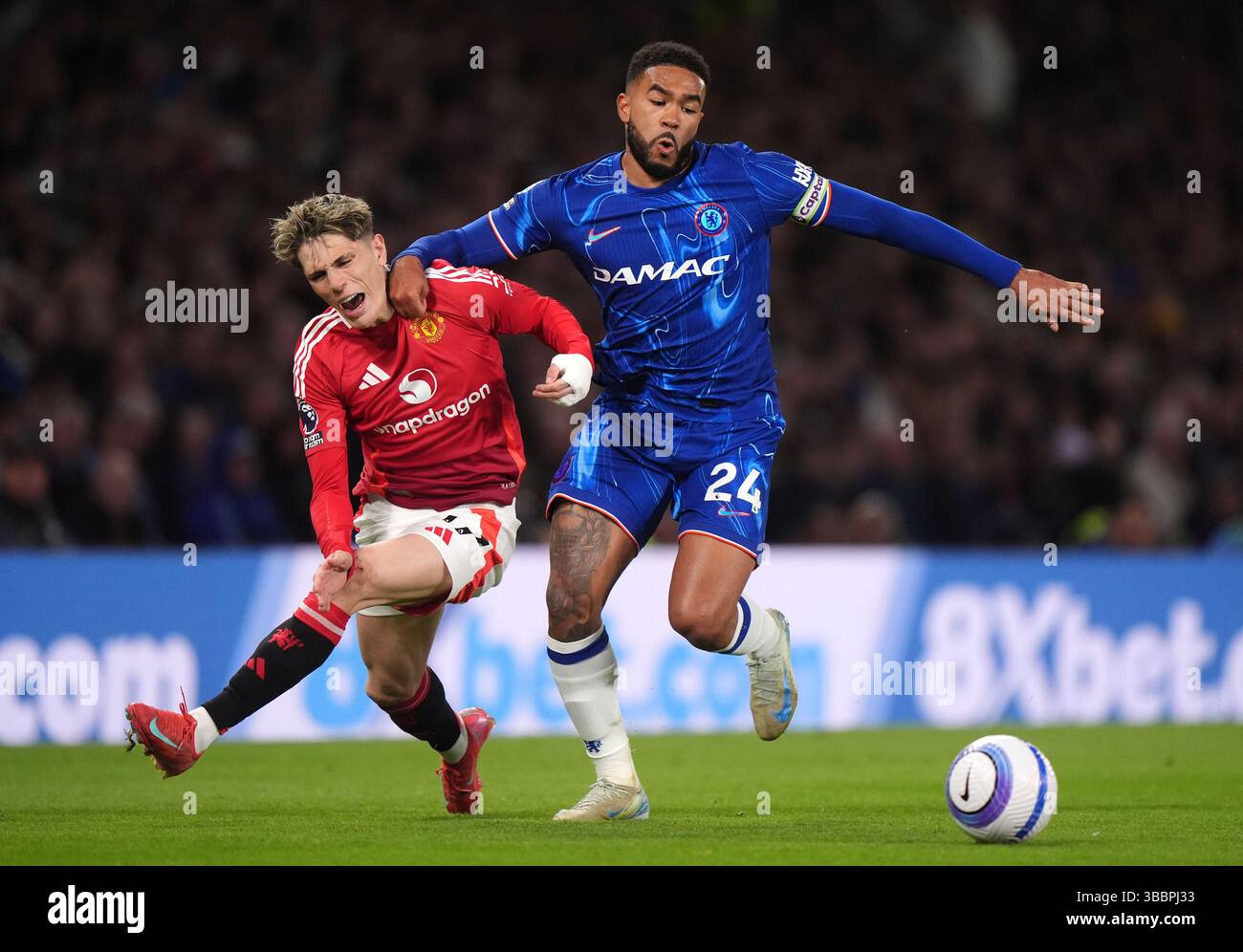 Manchester United's Alejandro Garnacho (left) and Chelsea's Reece James ...