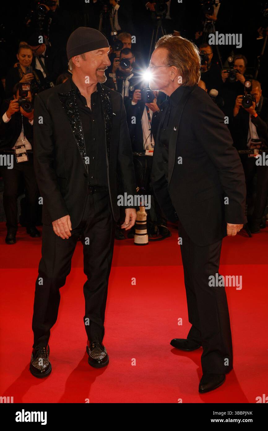 The Edge, left, and Bono pose for photographers upon arrival at the ...
