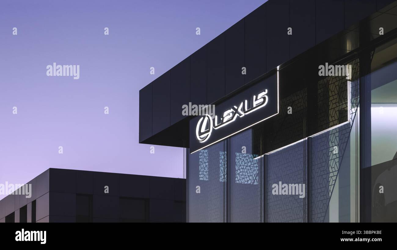 Lexus logo on a dealership in picturesque sunset setting Stock Photo ...