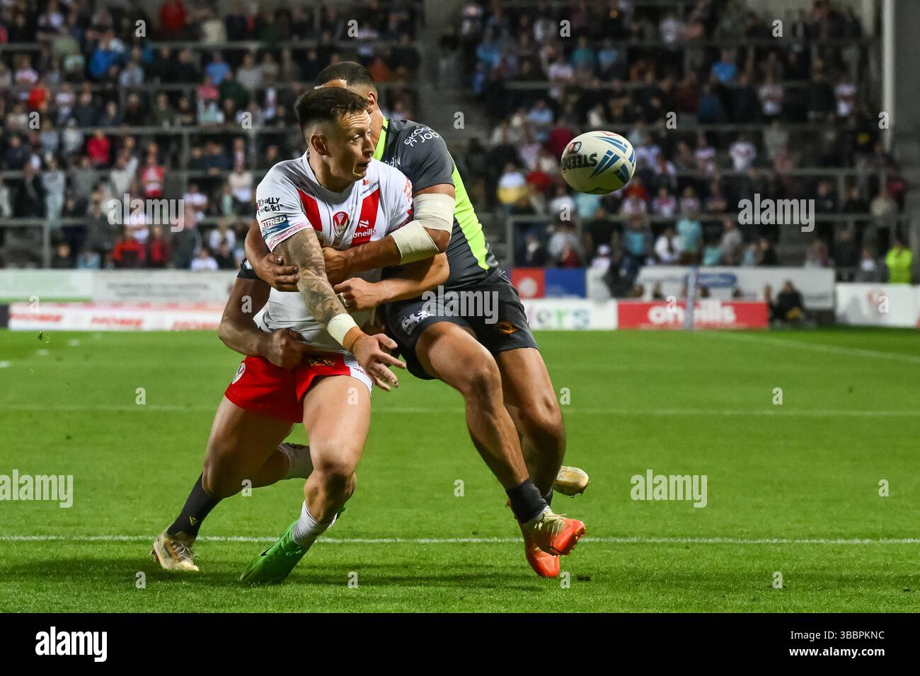 ST. HELENS, ENGLAND - 15 MAY 2025: Deon Cross of St. Helens offloads ...