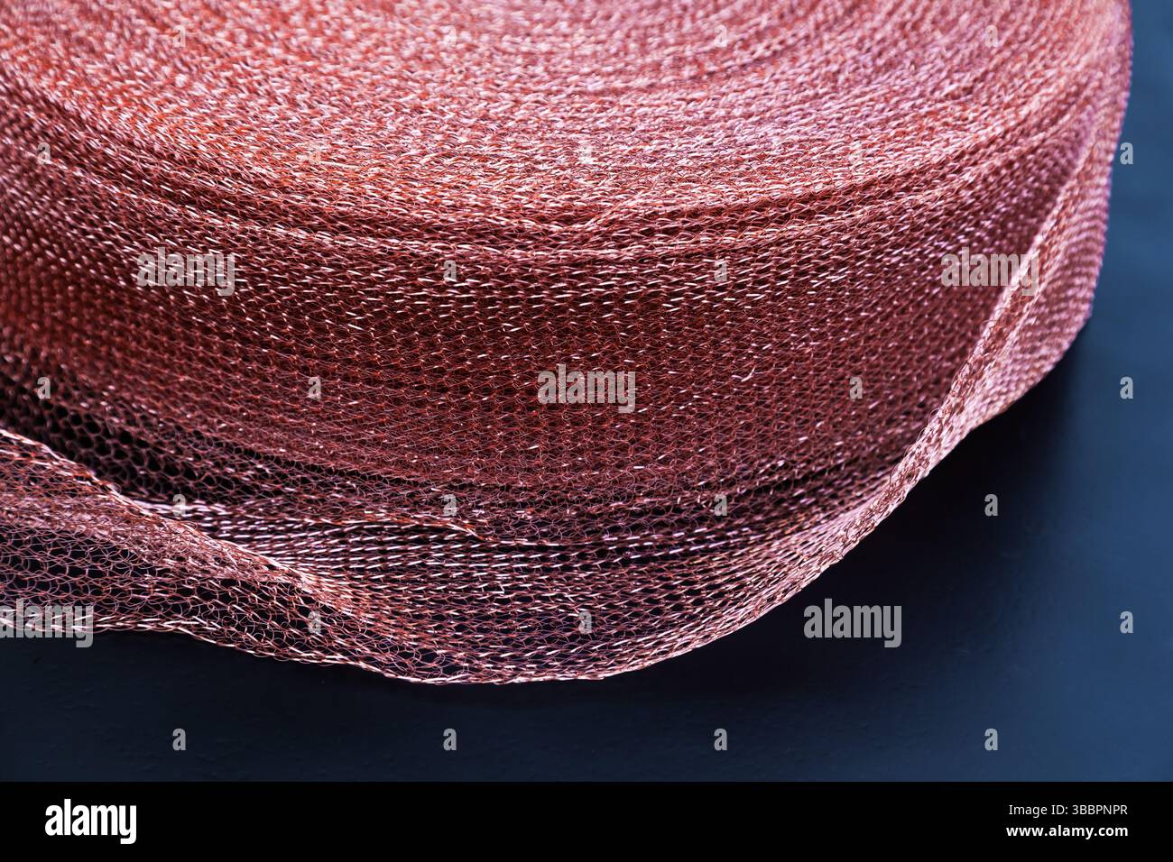 Copper mesh, twisted into a roll, close up. Twisted copper mesh Stock ...