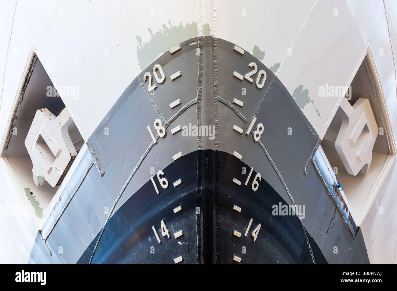 The bow of a cargo ship with anchors. The bow of the tugboat with the ...