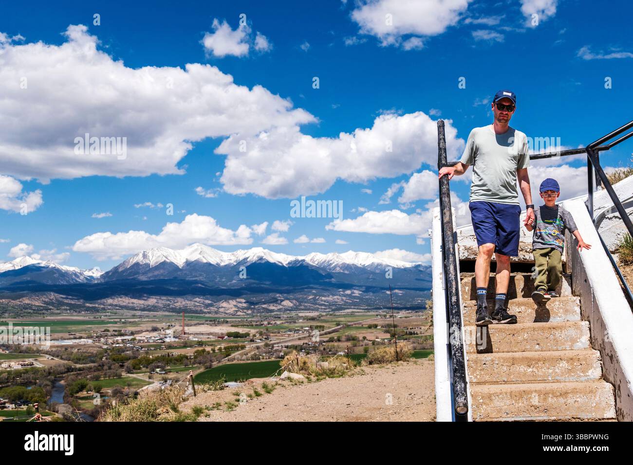 Father and four-year-old boy .descending stairs on historic Tenderfoot ...