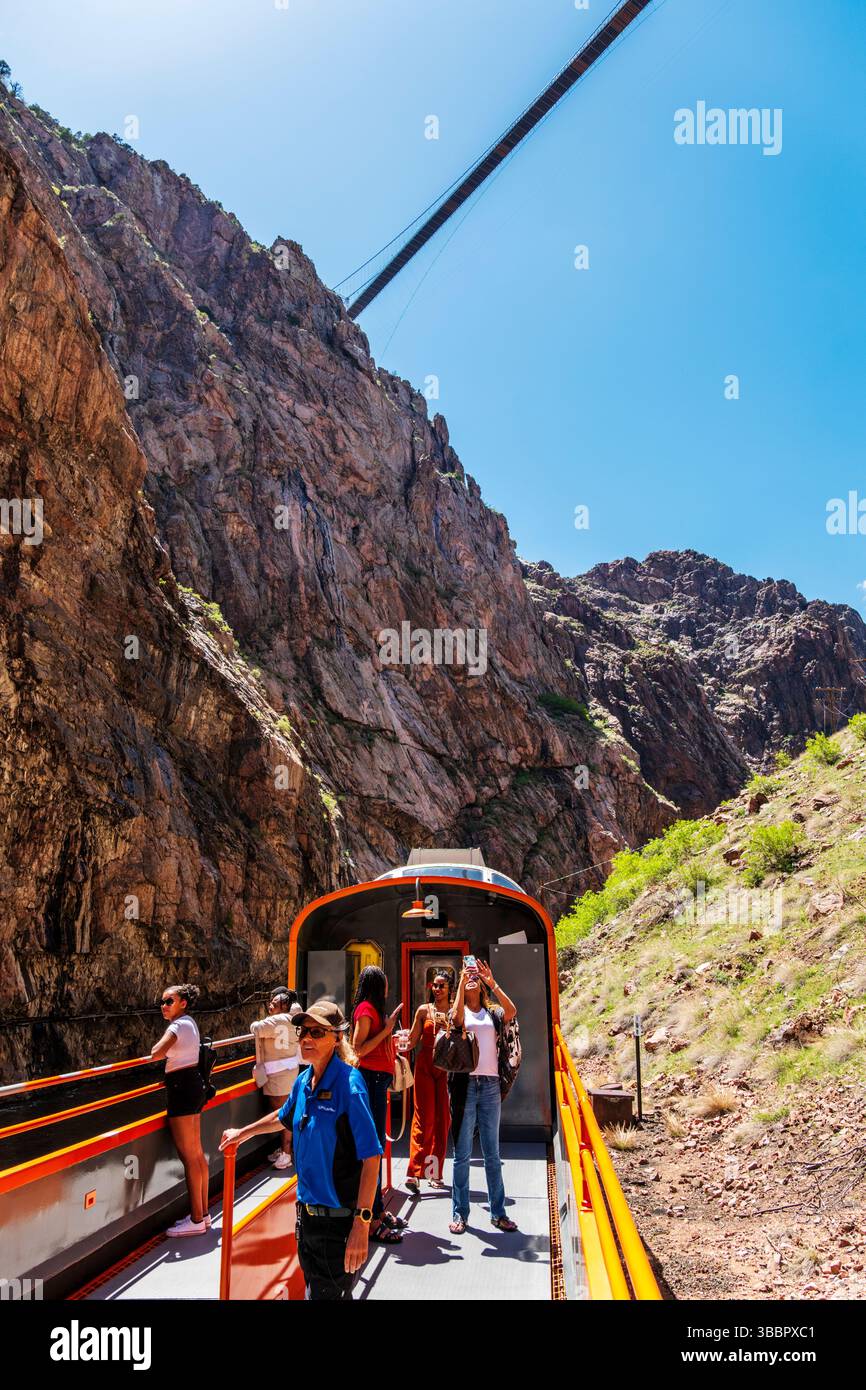 Tourists view the Royal Gorge Bridge from aboard the historic Royal ...